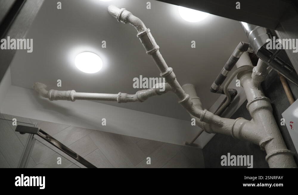 Complex plumbing system of pipes under ceiling Stock Video Footage - Alamy