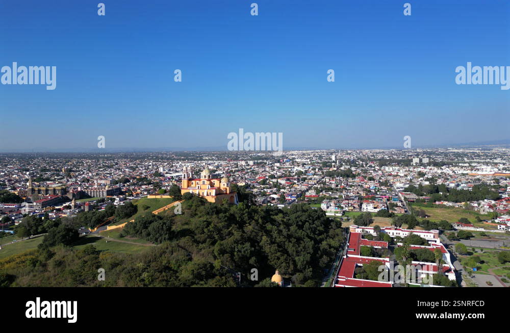 Aerial of the great pyramid with church building in Cholula, Mexico ...