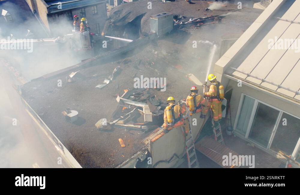 Firefighting team Stock Videos & Footage - HD and 4K Video Clips - Alamy