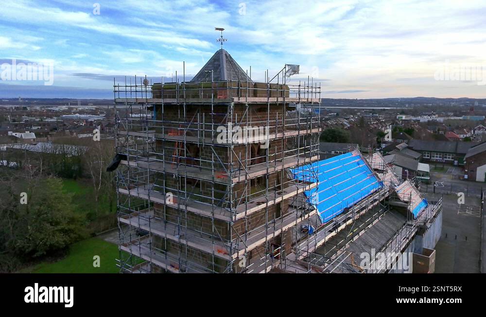 Church exterior scaffolding aerial view circling renovation framework ...