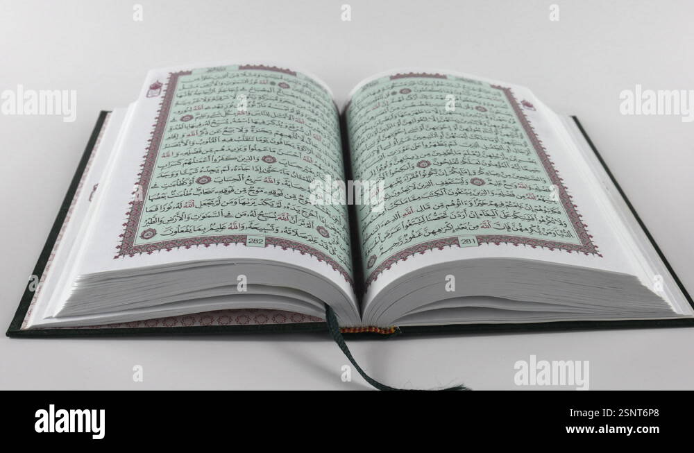 Open Page Of Quran Book With Islamic Arabic Calligraphy Script On White ...