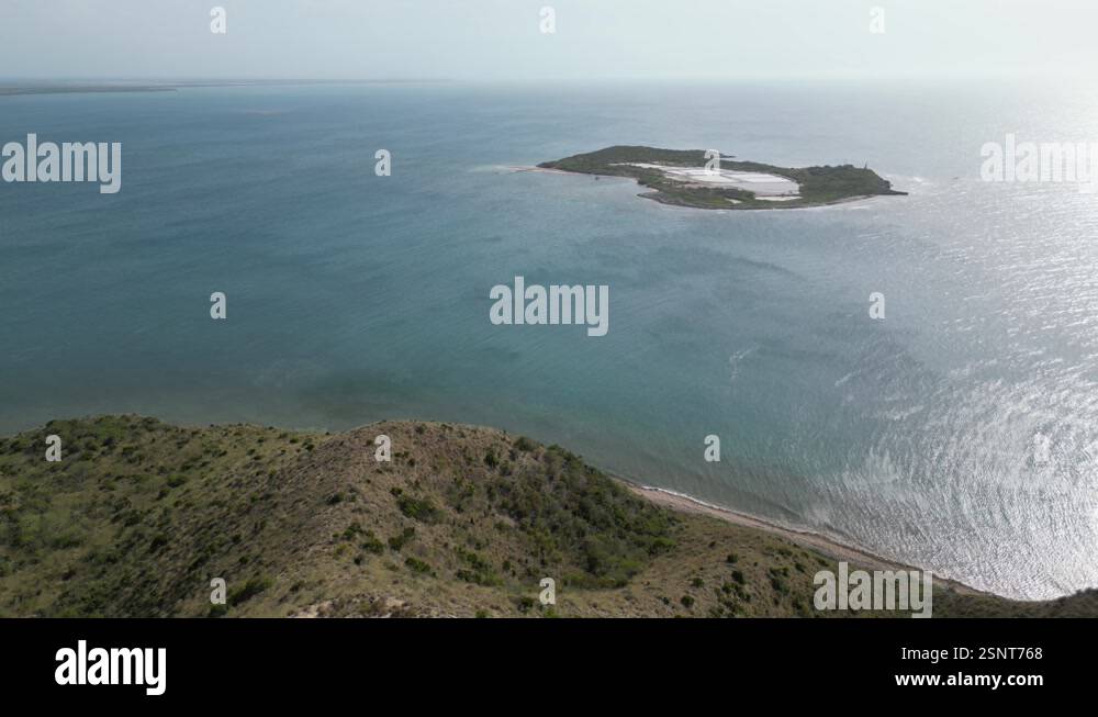 Flying from El Morro limestone mountain towards Isla Cabra island in ...