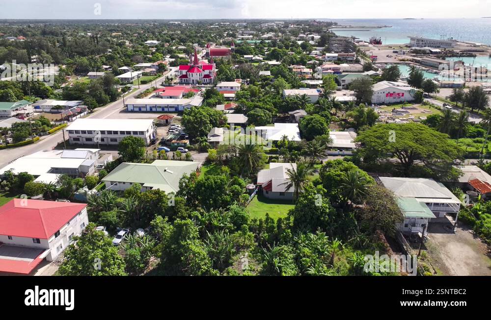 Drone flyover houses in shore. Nukualofa city, capital of Tonga ...