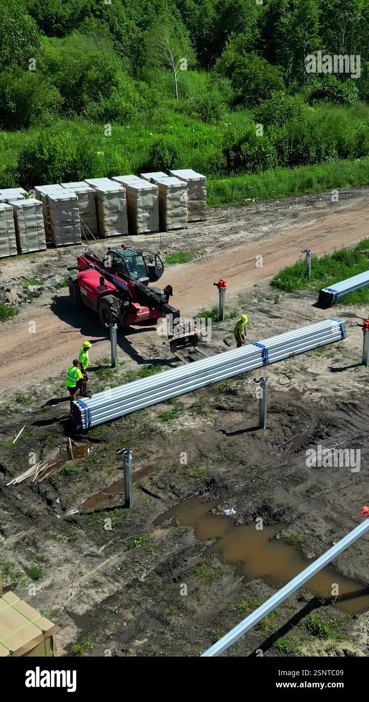Construction of solar farm frames Stock Video Footage - Alamy