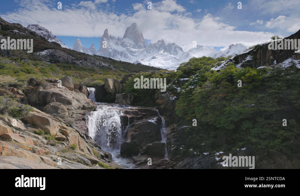 zoom in on secret waterfall and monte fitz roy on an autumn afternoon ...