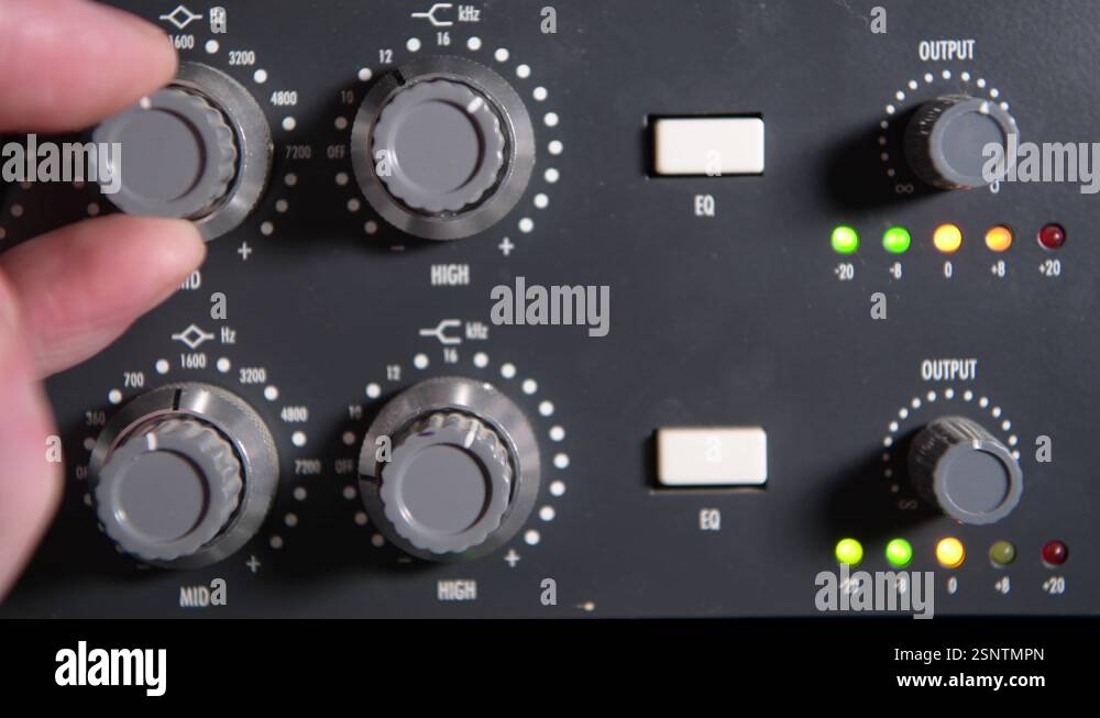 Sound engineer adjusting the dials Stock Video Footage - Alamy