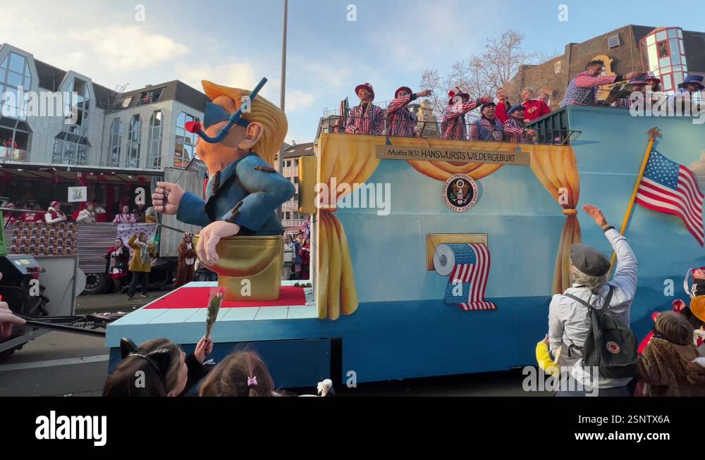 Cologne carnival parade with Donald Trump in a golden toilet political ...