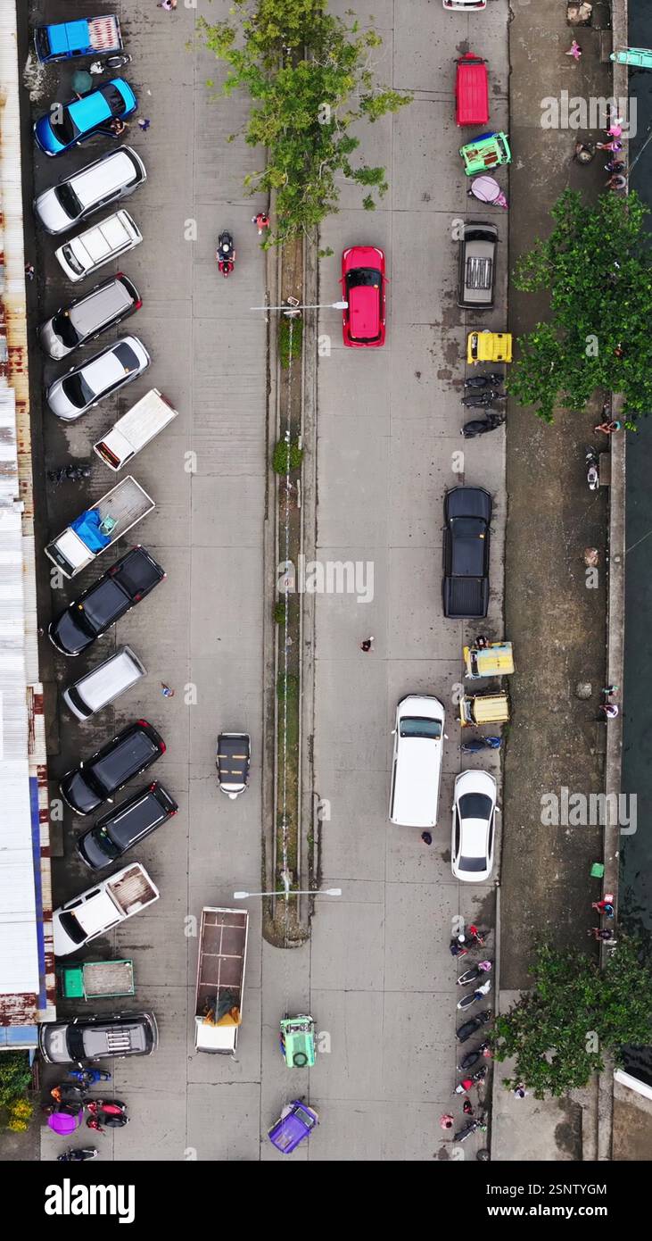 Vertical Bird’s Eye Dolly Forward Along Busy Surigao City Boulevard ...