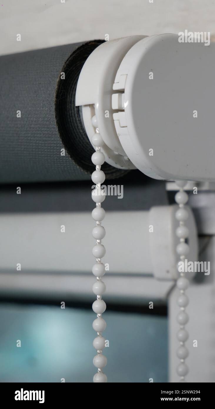 mechanism of roller blinds indoors,Close-up. Roller shutter system day ...