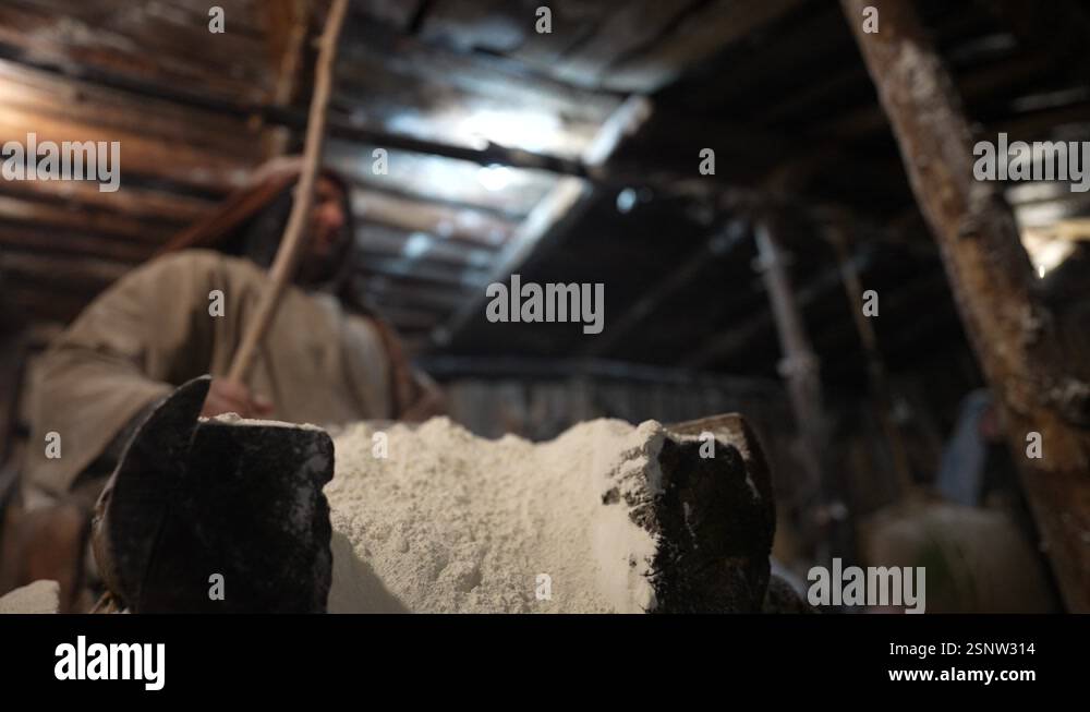 Miller Grinding Wheat Flour in Traditional Scene Reenactment of Ancient ...