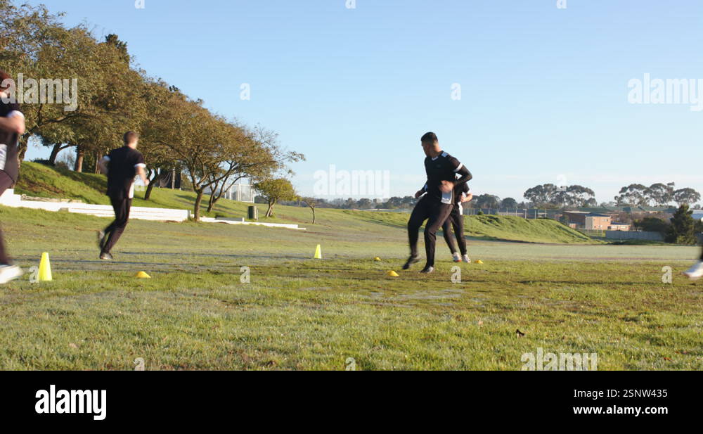 Running on field, boys practicing cricket drills during school sports ...