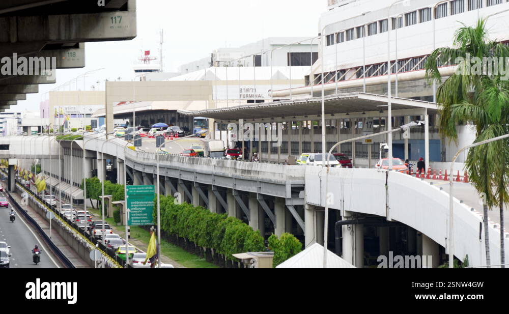 A bustling airport terminal showcasing the lively traffic and organized ...
