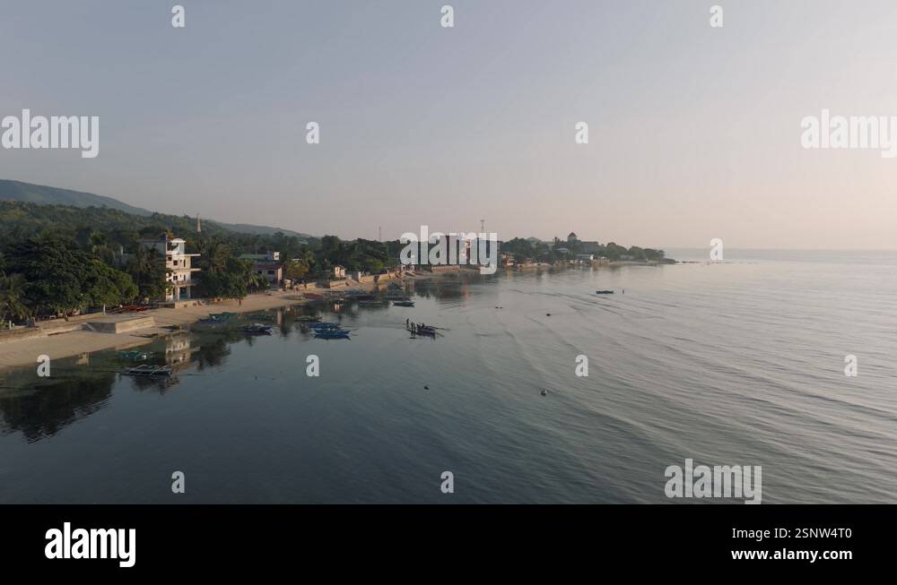 Traditional Bangka boats at beach on calm sea in Oslob Cebu ...