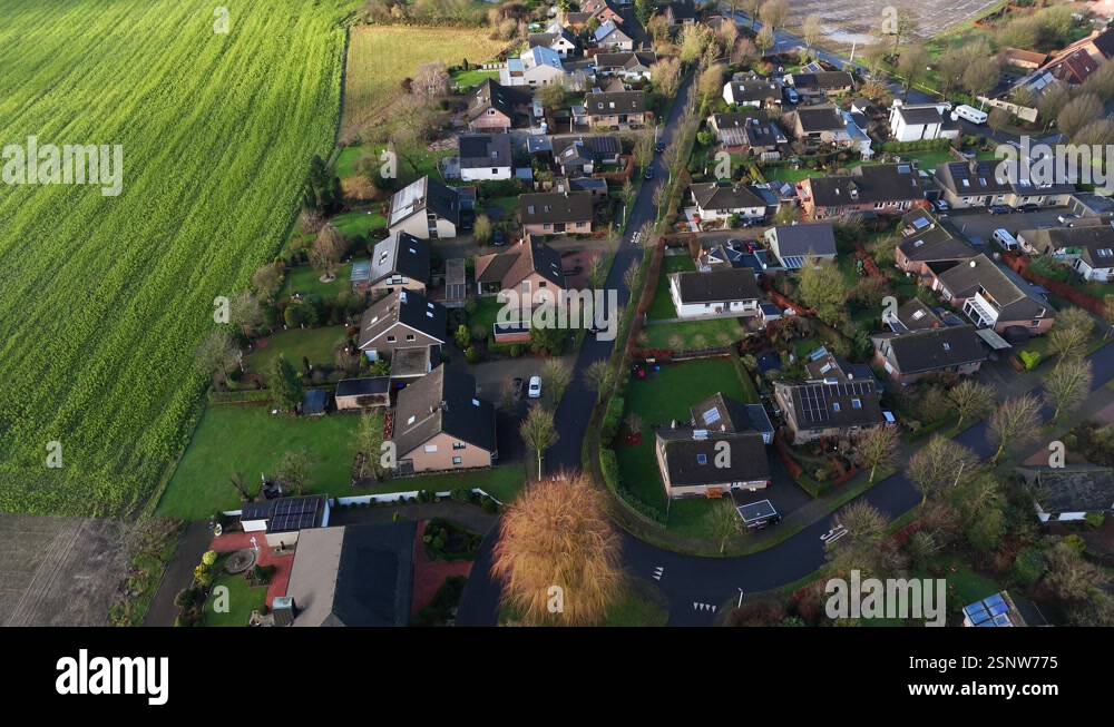 Upper class housing area in rural area of American town. Large single ...