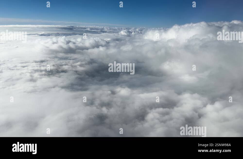 Layers of cumulus clouds, side view from an airplane window Stock Video ...