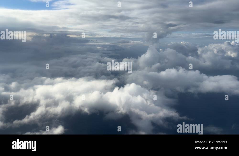 Layers of cumulus clouds, side view from an airplane window Stock Video ...