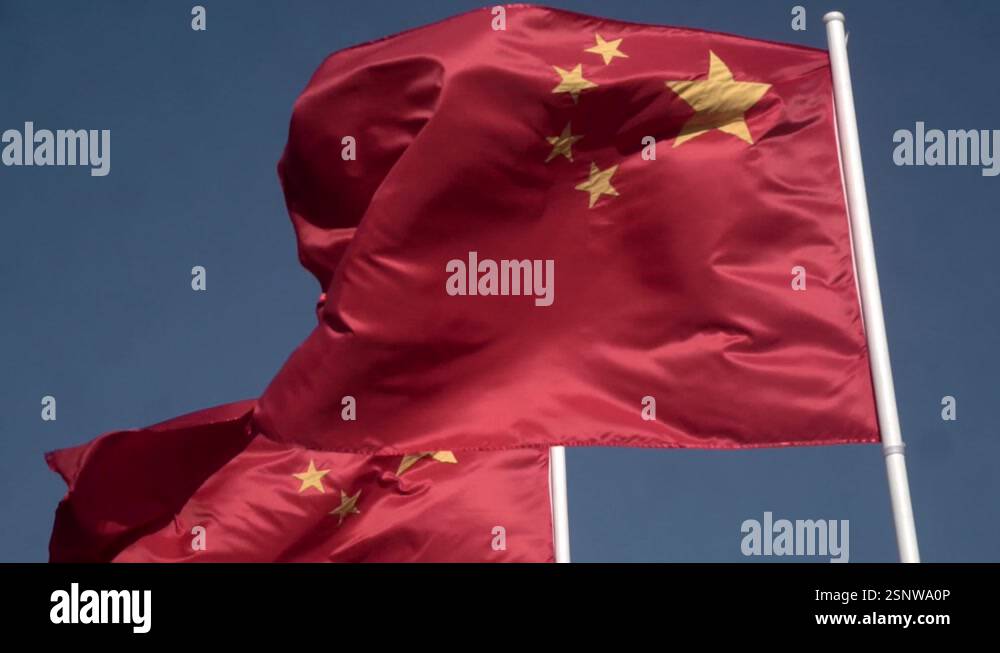 The national flags of China waves on a flagpole Stock Video Footage - Alamy