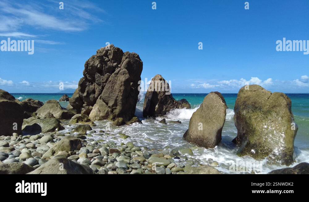 Rock Formations and Waves at Banbanon Beach, Surigao del Norte Stock ...