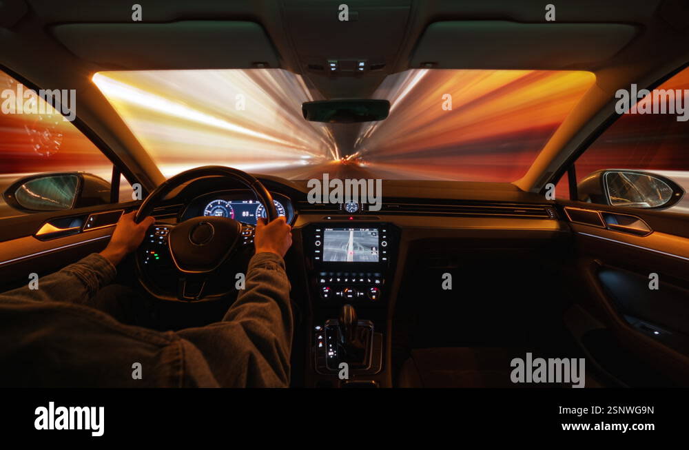 Windshield view timelapse high speed drive in city at night traffic light trails Stock Video ...