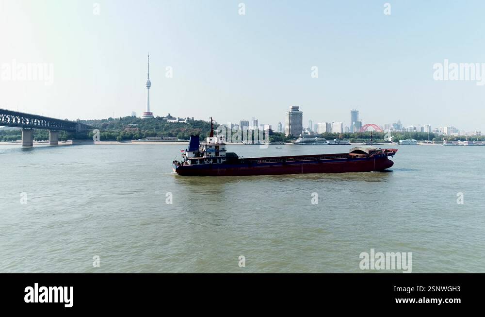 A ship slowly navigating along the Yangtze River in Wuhan Stock Video ...