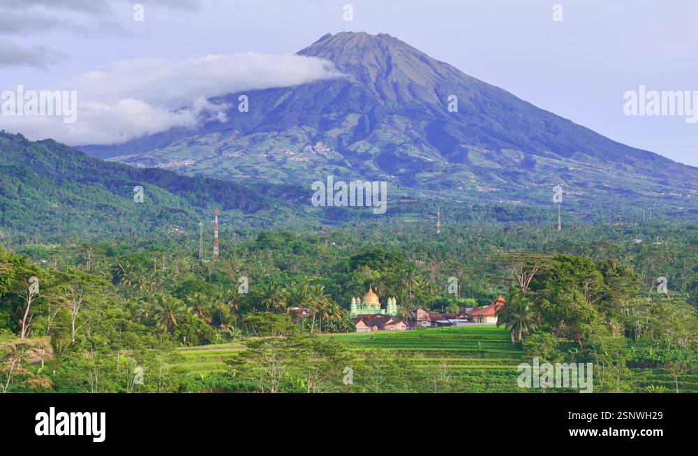 Indonesian landscape view with the stratovolcano Mount Sumbing Stock ...