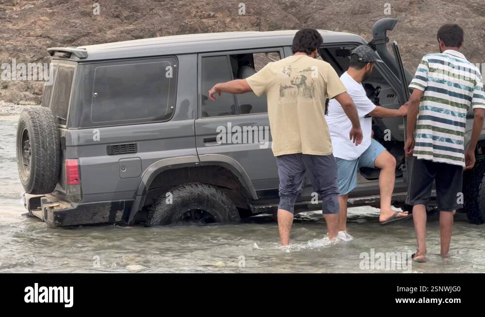 Off roading jeep stuck in middle of river stream and locals at rescue ...