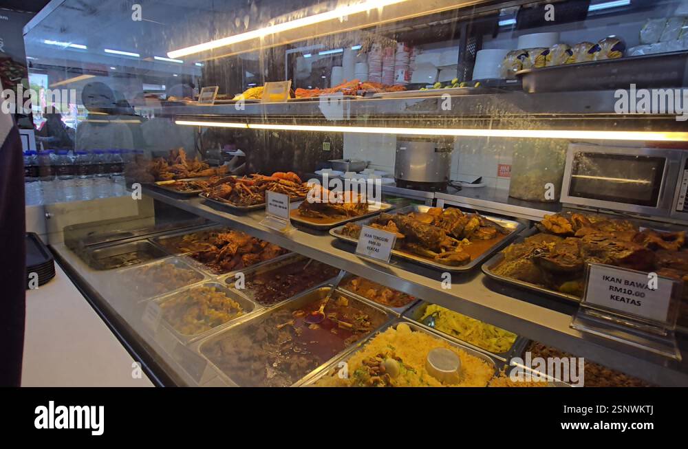 Delicious Malaysian Food on Display Behind Glass at a Service Station ...