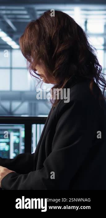 Vertical Video Admin In Data Center Using Laptop To Update Storage