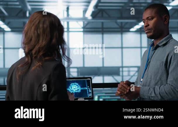 Team Of Engineers In Data Center With Tablet Integrating Ai Driven Automation Tools Doing