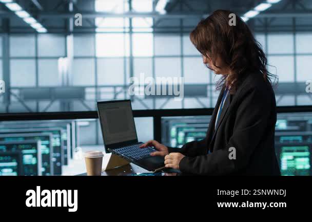 Admin in data center using laptop to update storage arrays, configuring network virtualization ...