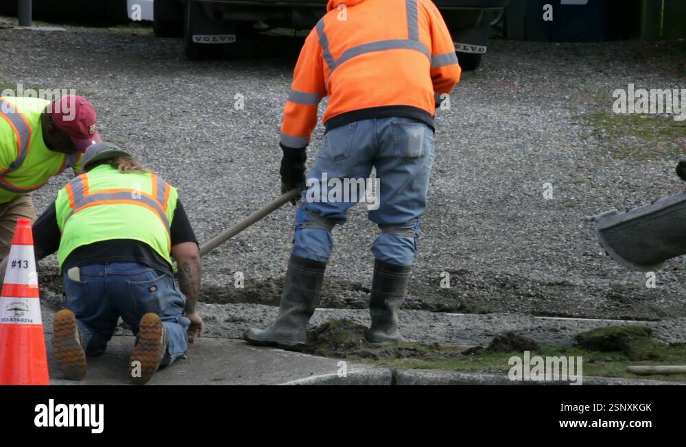 Construction work-sidewalk Stock Video Footage - Alamy