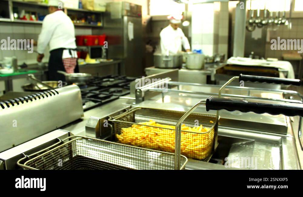 french fries in fryer fast food Stock Video Footage - Alamy