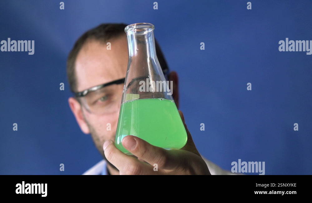 Scientist doing science experiment in laboratory HD Stock Video Footage ...