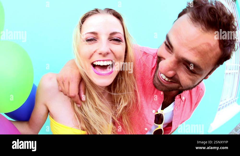 Happy couple with balloons Stock Video Footage - Alamy