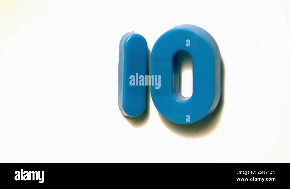 Blue number ten lifting off white background Stock Video Footage - Alamy
