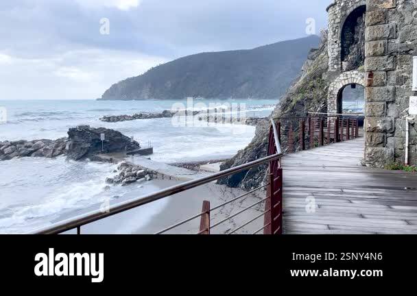 Moneglia, Italy - 09 January 2025. Old tower near sea in storm on ...