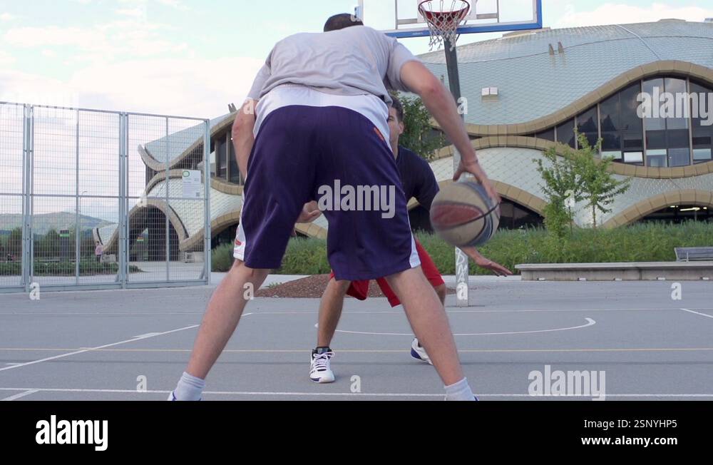 Slow-Mo: Basketball Player Dribbling And Scoring From The Block Stock ...
