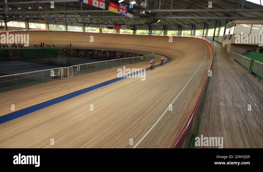 Cycling track Pursuit tracking focus Film Tilt Stock Video Footage - Alamy