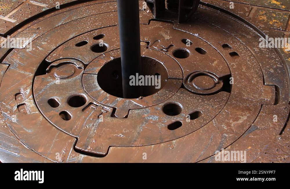 Slip on the rotary table while drilling oil well and pipe being rotated ...