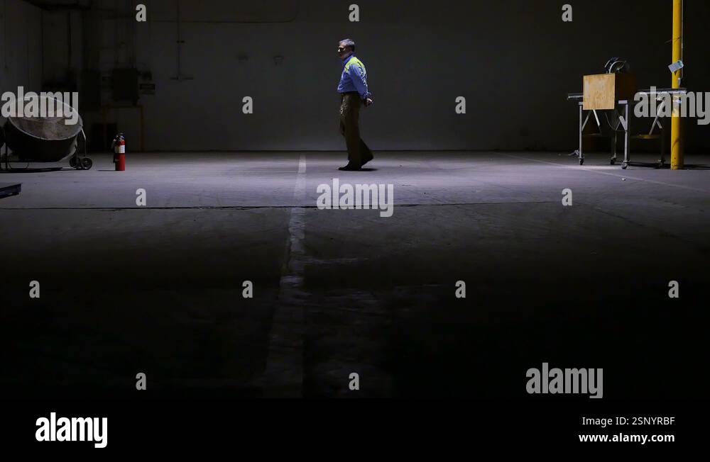 man pacing in a large warehouse 4k Stock Video Footage - Alamy