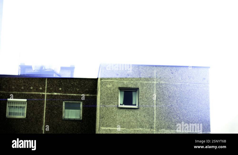 Concrete Block of Flats 11 stylized tilt down Stock Video Footage - Alamy