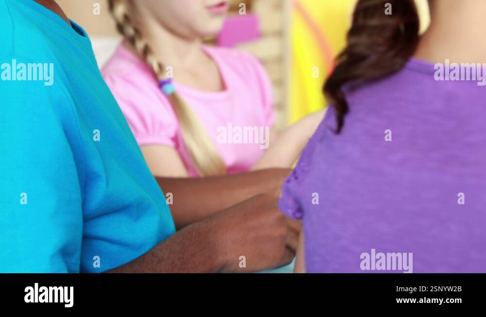 Preschool class playing with childs play clay Stock Video Footage - Alamy