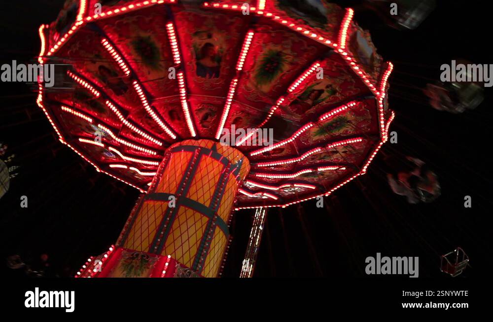 Colorful Carousel Spinning at Night Stock Video Footage - Alamy