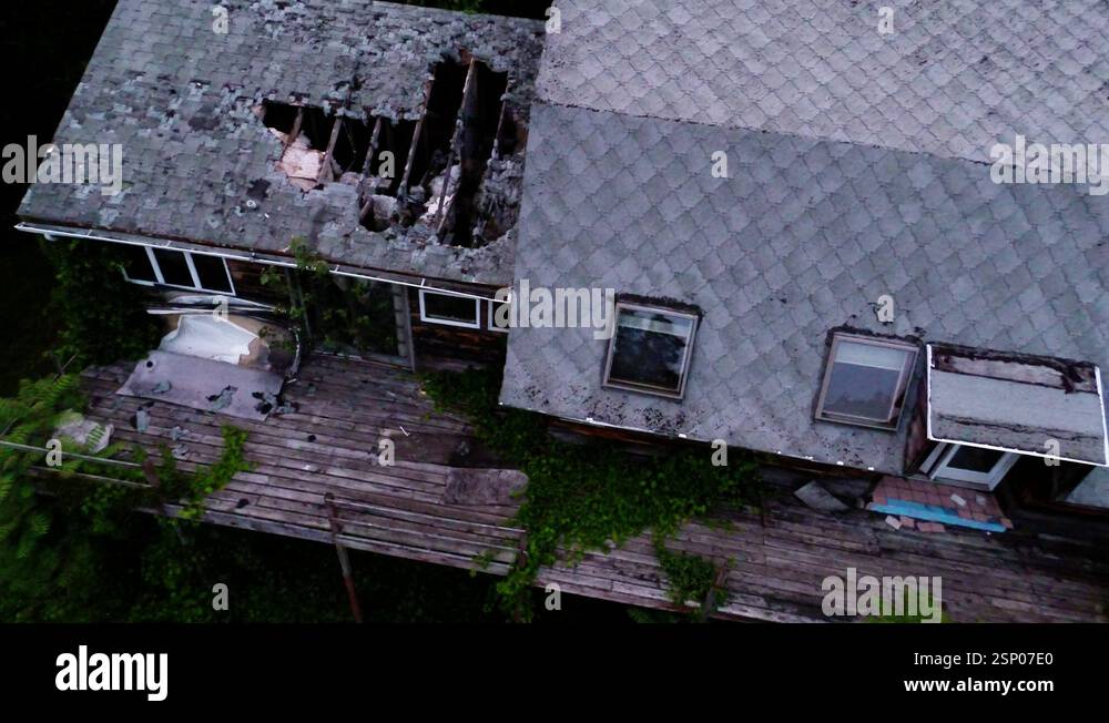 In air flight above wooden neglected abandoned farm house Stock Video ...