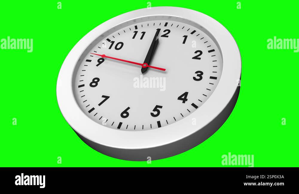 Clock ticking on green background Stock Video Footage - Alamy
