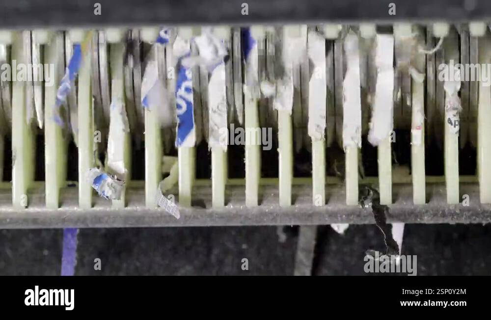 Paper shredder chopping up and tearing documents Stock Video Footage ...