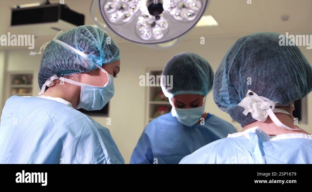 Surgical team working together in operating theater Stock Video Footage ...