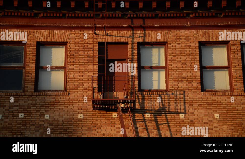 Fire Escape on a red bricked building in California Stock Video Footage ...