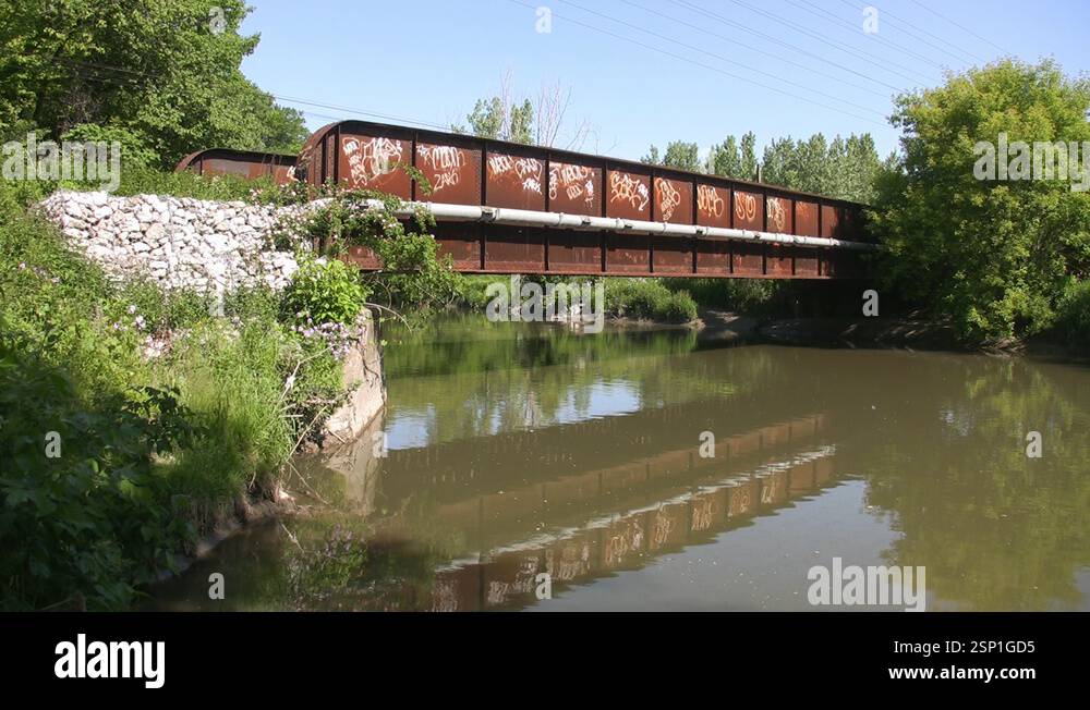 Rusty train bridge. Summer river Stock Video Footage - Alamy