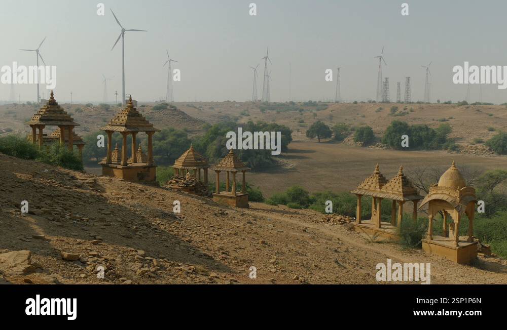 Modern and ancient India, wind farm in desert and historic cenotaphs ...